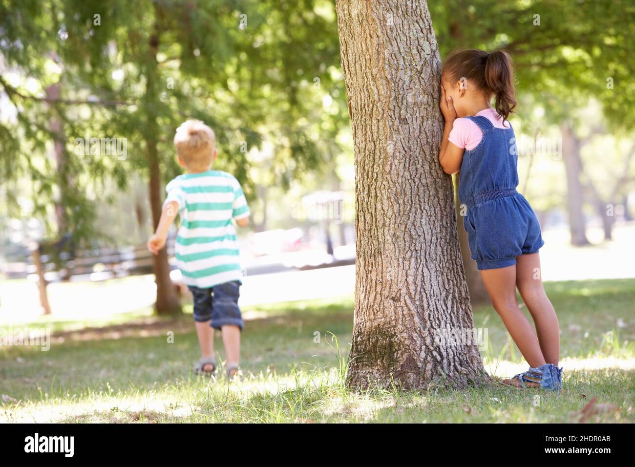 Kids hiding with games hi-res stock photography and images - Alamy