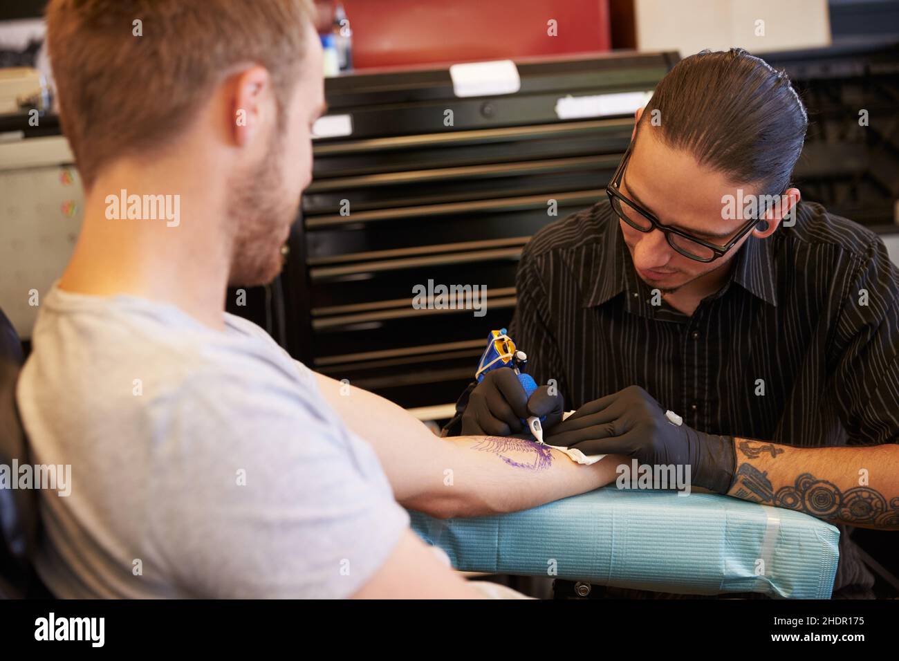 tattoo, tattooing, tattoo artist, tattoos Stock Photo - Alamy