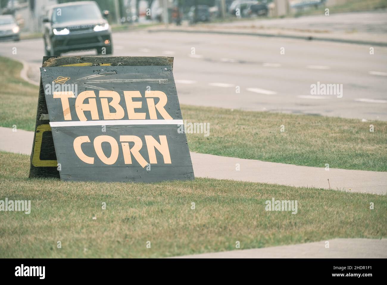 July 31 2021 - Calgary Alberta Canada - Taber Corn sign beside a road ...