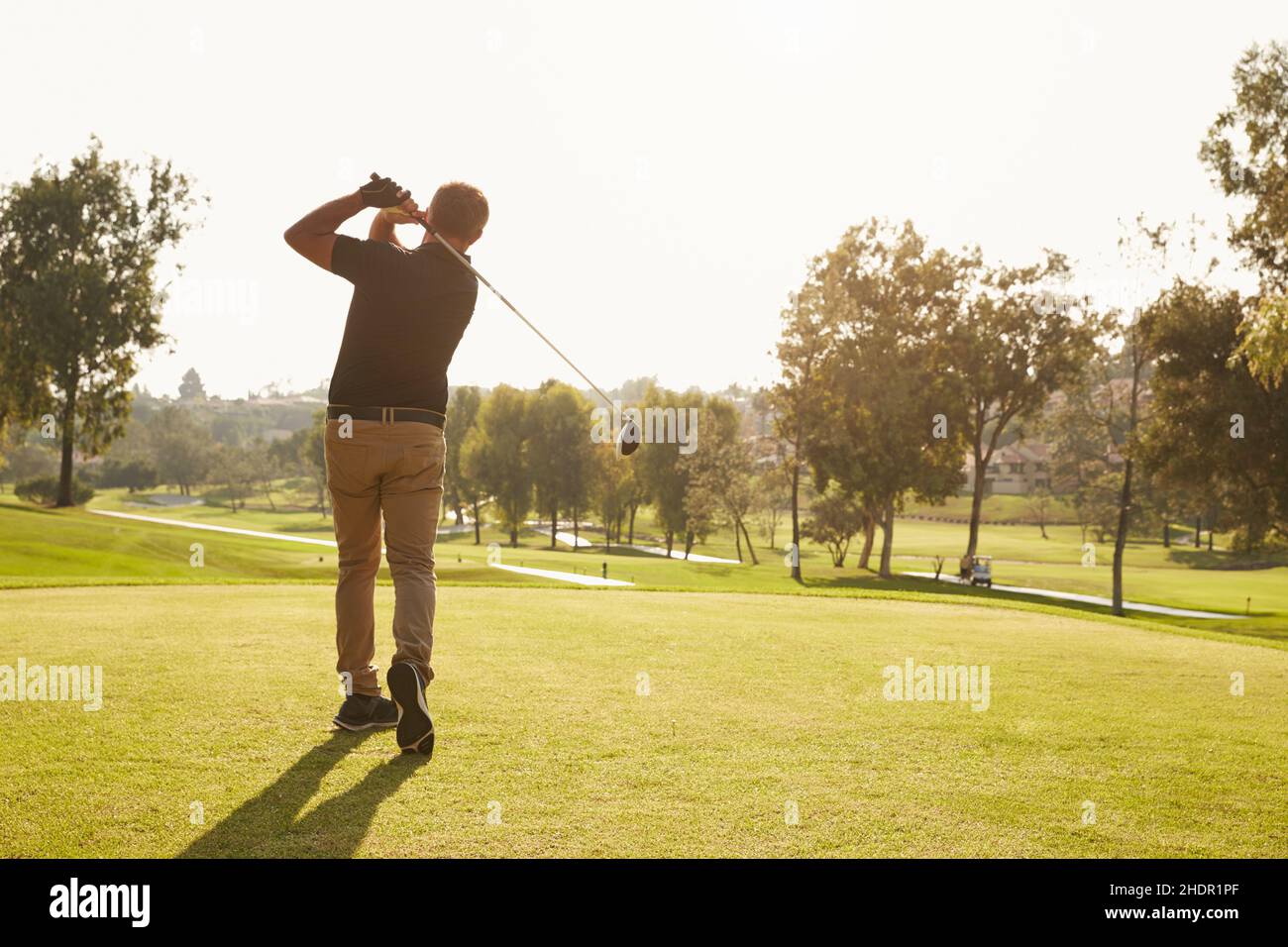 Rear view teeing off golf hi-res stock photography and images - Alamy