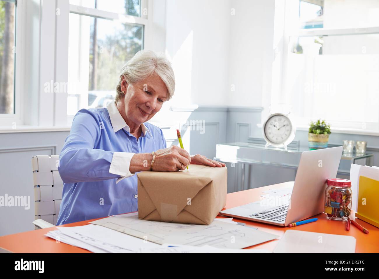 Lady mailing hi-res stock photography and images - Alamy