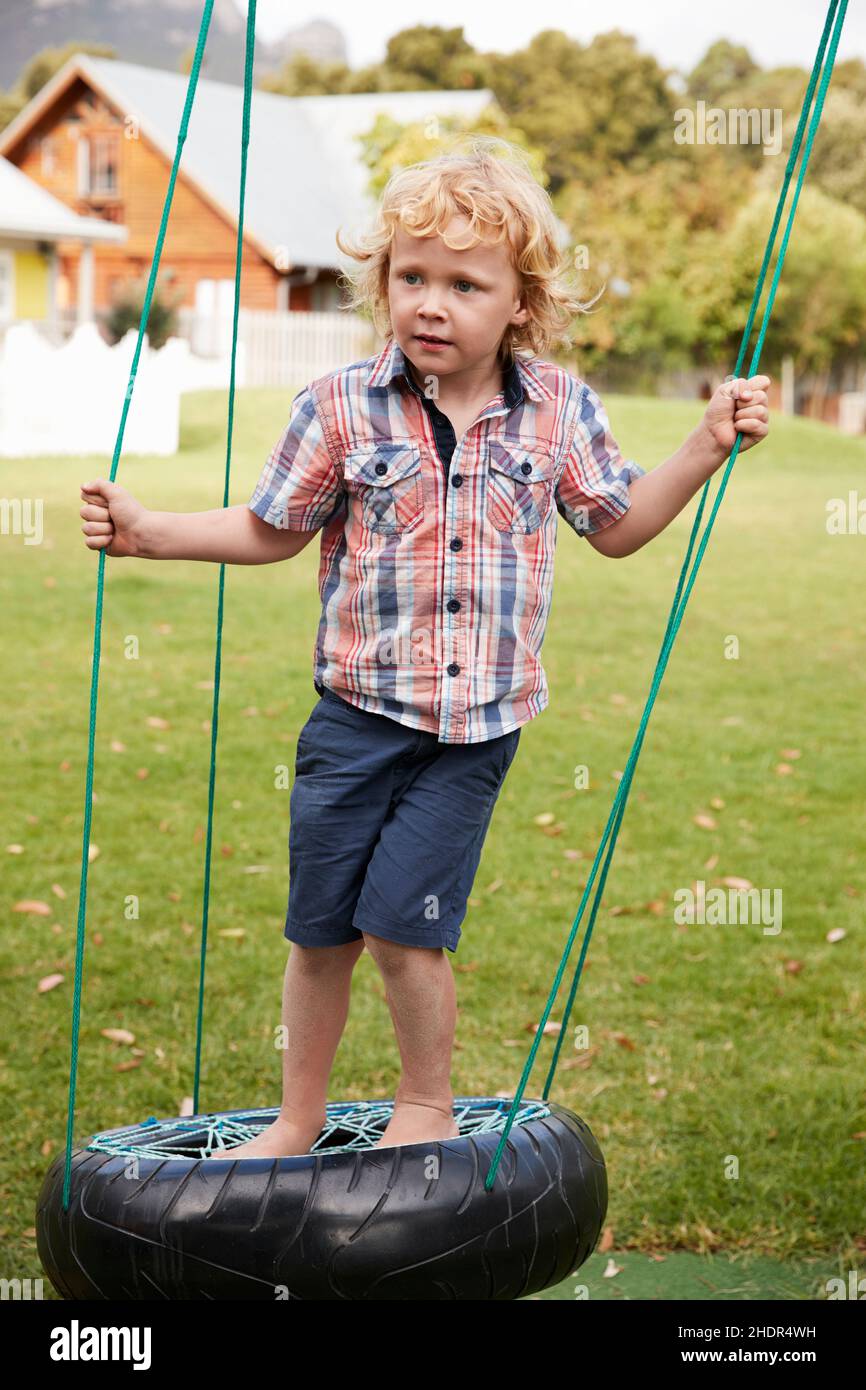 boy, swing, playground, boys, playgrounds Stock Photo - Alamy