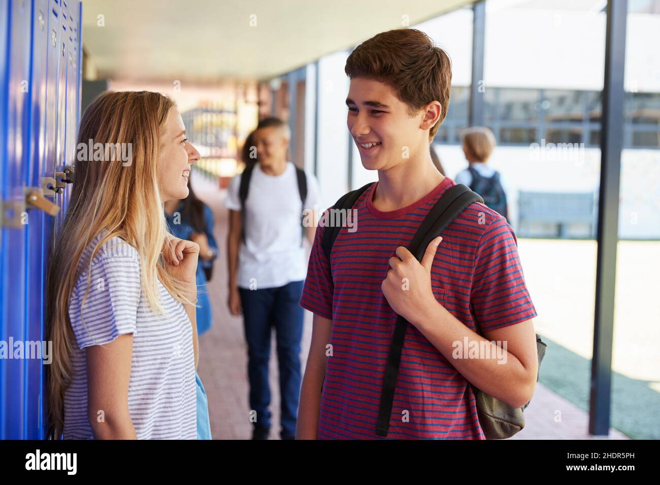 Teen boys and girls flirting school hi-res stock photography and images ...
