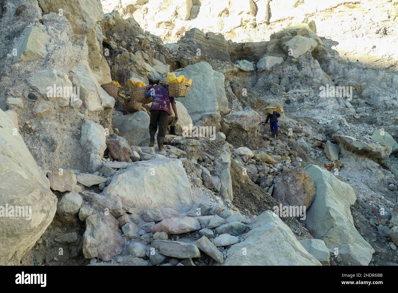 Kawah Ijen, Indonesia, 2 June, 2021. Worker carries sulfur inside Ijen ...