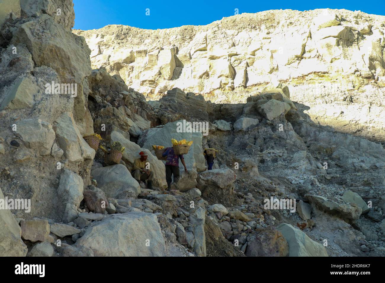 Kawah Ijen, Indonesia, 2 June, 2021. Worker carries sulfur inside Ijen ...