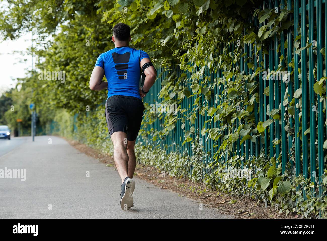 Back view sportsmen running hi-res stock photography and images - Alamy