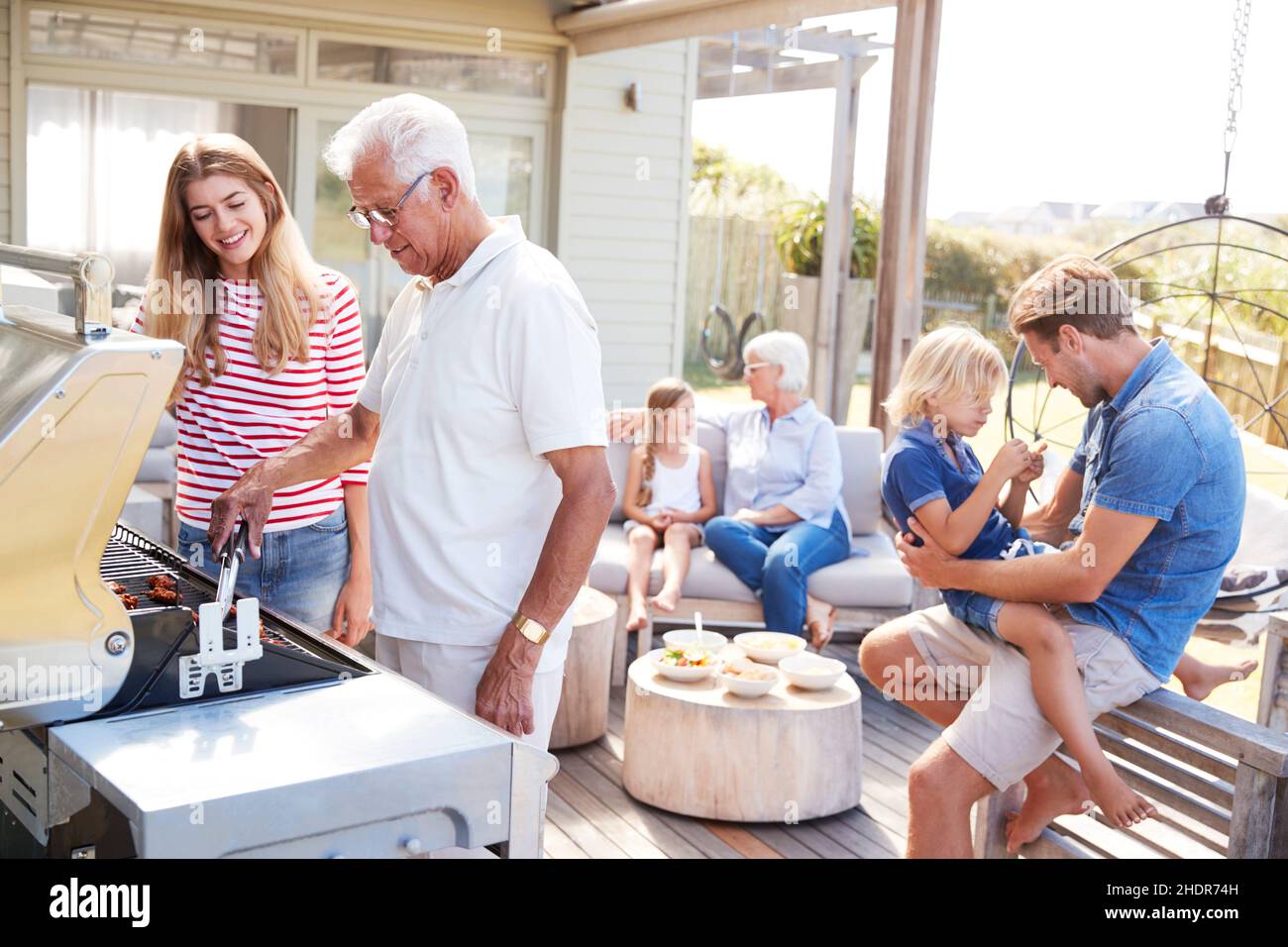 broiling, family, patio, families, patios Stock Photo - Alamy