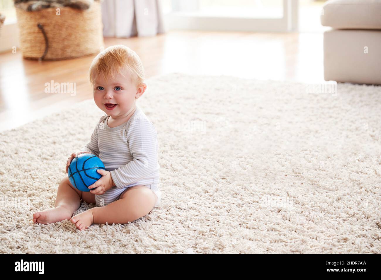 Toddlers playing balls hi-res stock photography and images - Alamy