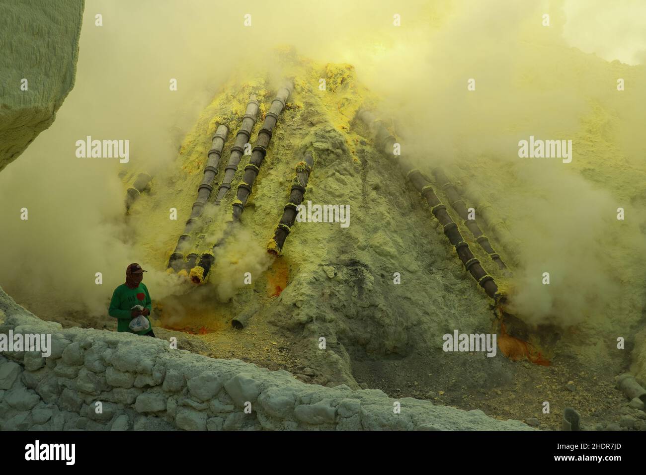 KAWAH IJEN VOLCANO, EAST JAVA, INDONESIA, 2 June, 2021. Sulfur miner ...