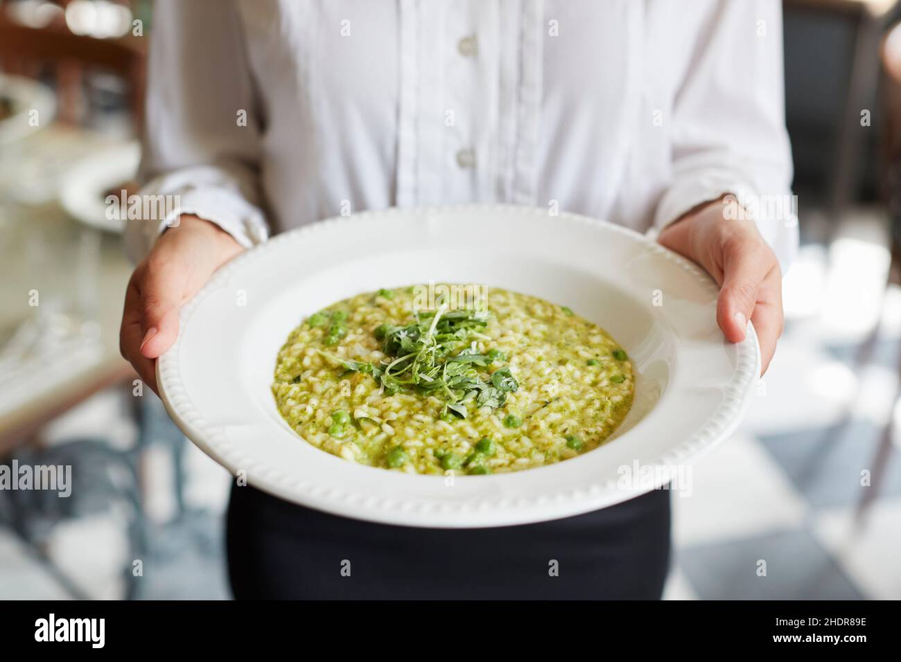 serve, vegetable risotto, serves Stock Photo - Alamy