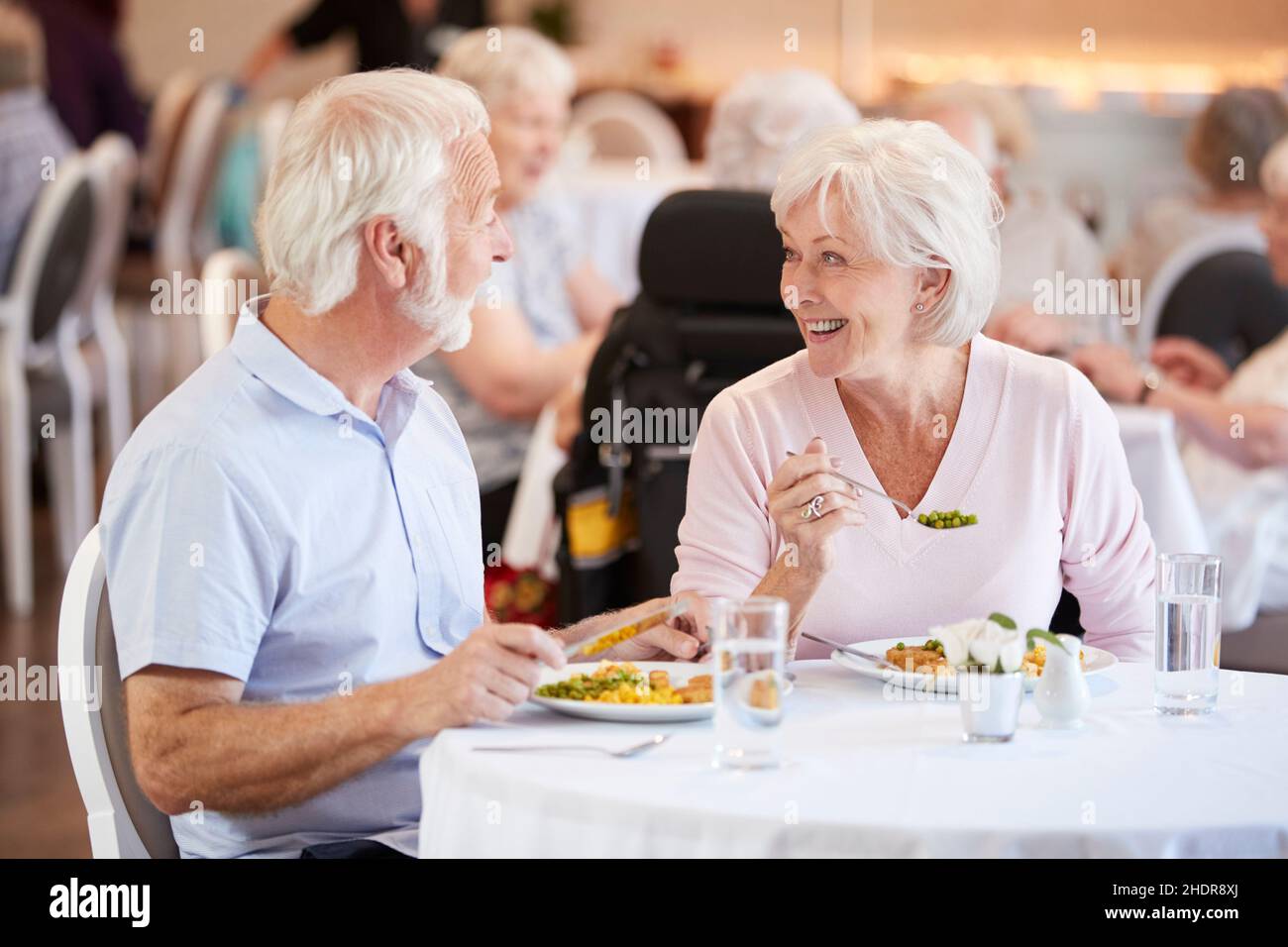 Three men eating together restaurant hi-res stock photography and ...