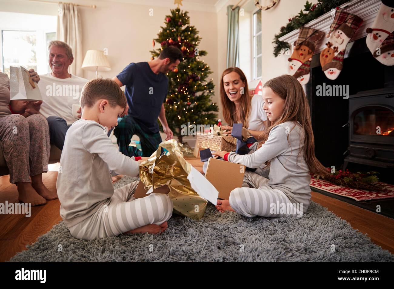 Woman unpacking gifts hi-res stock photography and images - Alamy