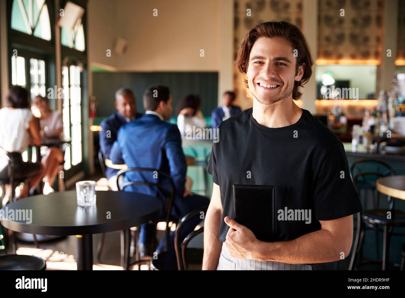 Waiters work young hi-res stock photography and images - Alamy