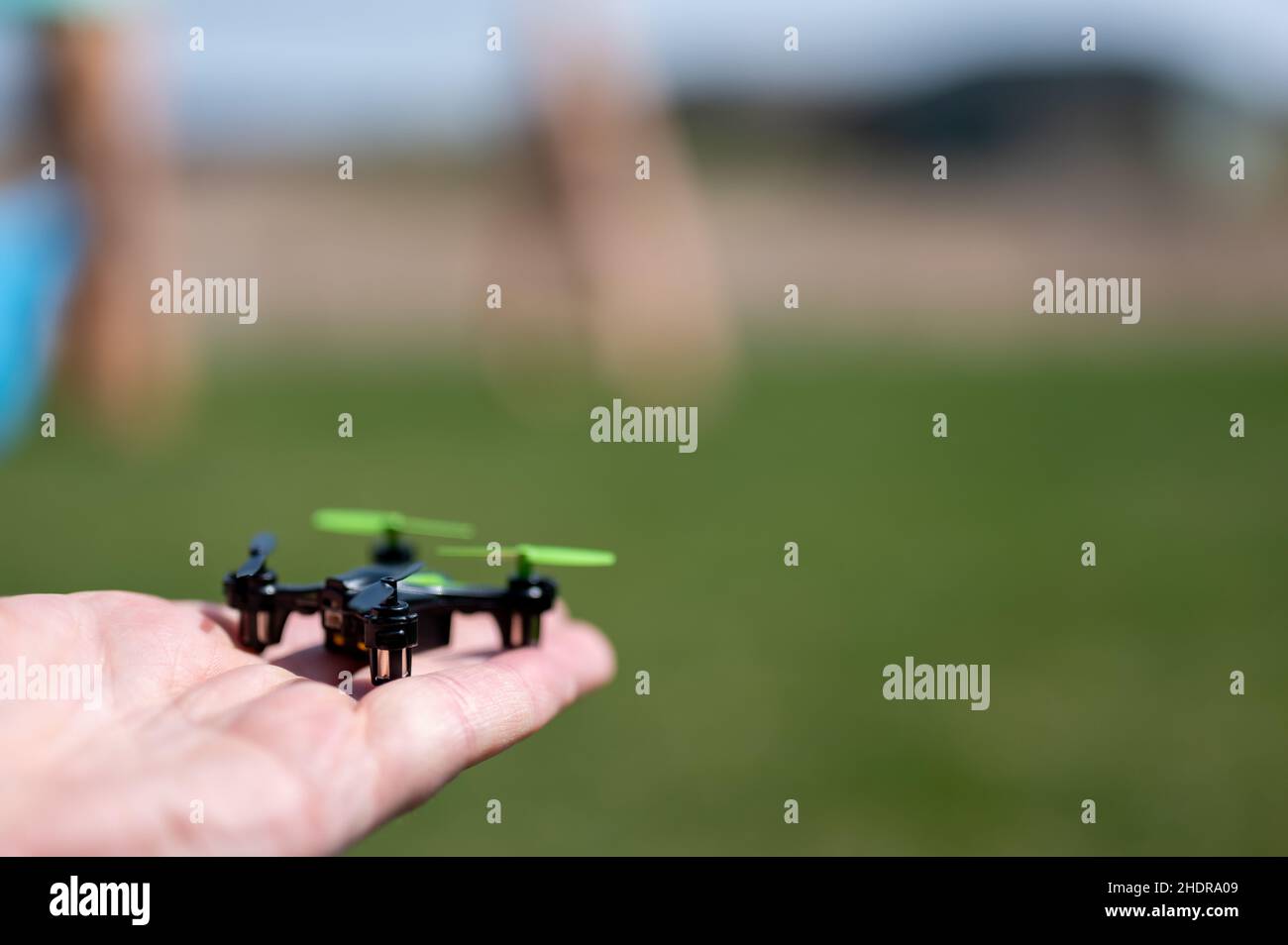 Miniature toy remote controlled drone taking off from a hand Stock ...