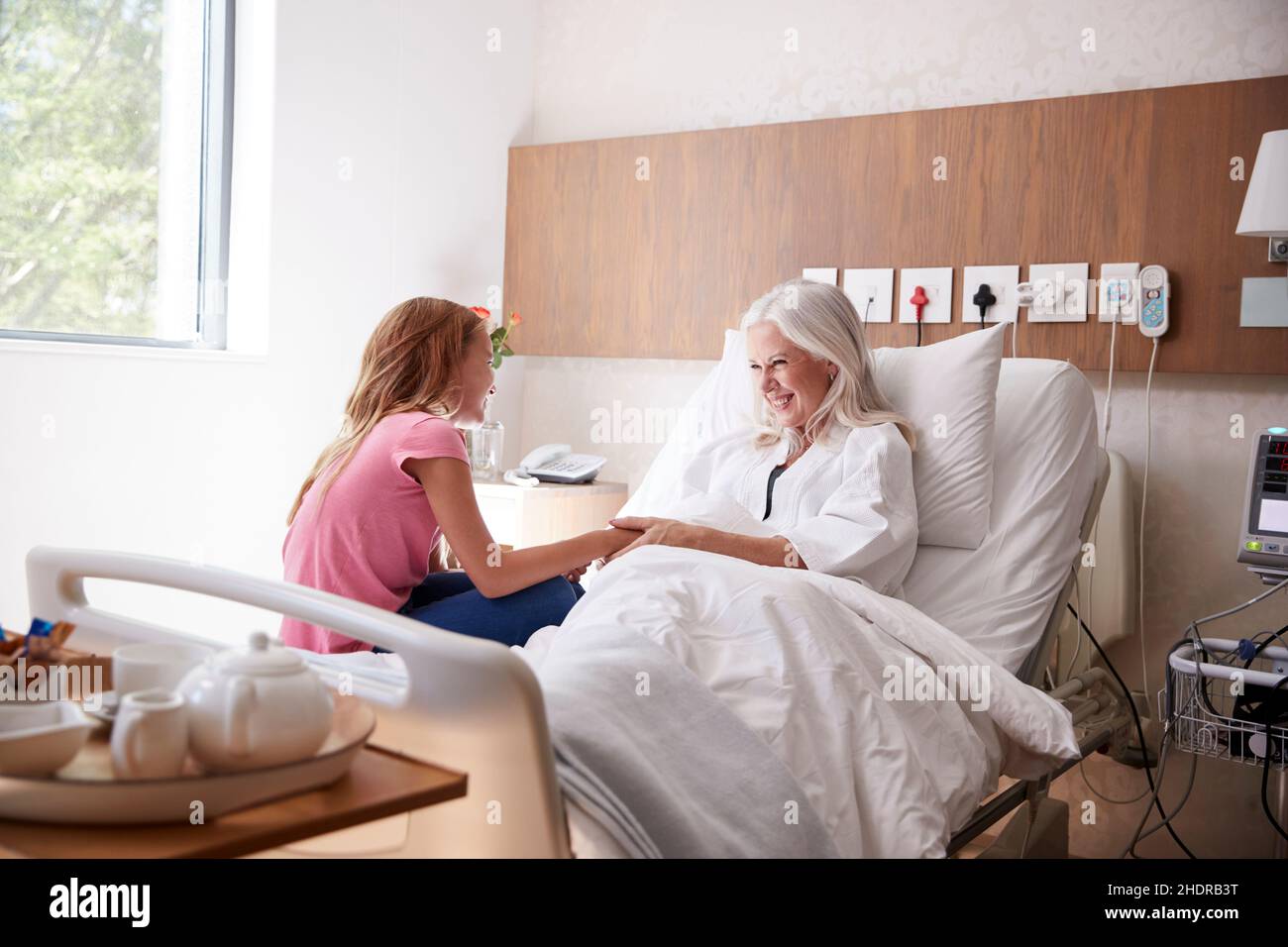 Child grandmothers bed hi-res stock photography and images - Alamy