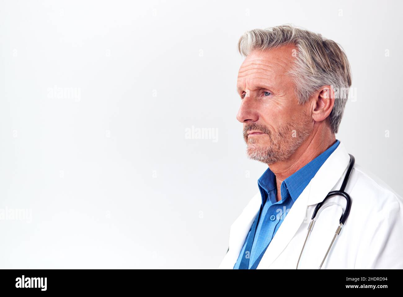 Serious mature male doctor hi-res stock photography and images - Alamy