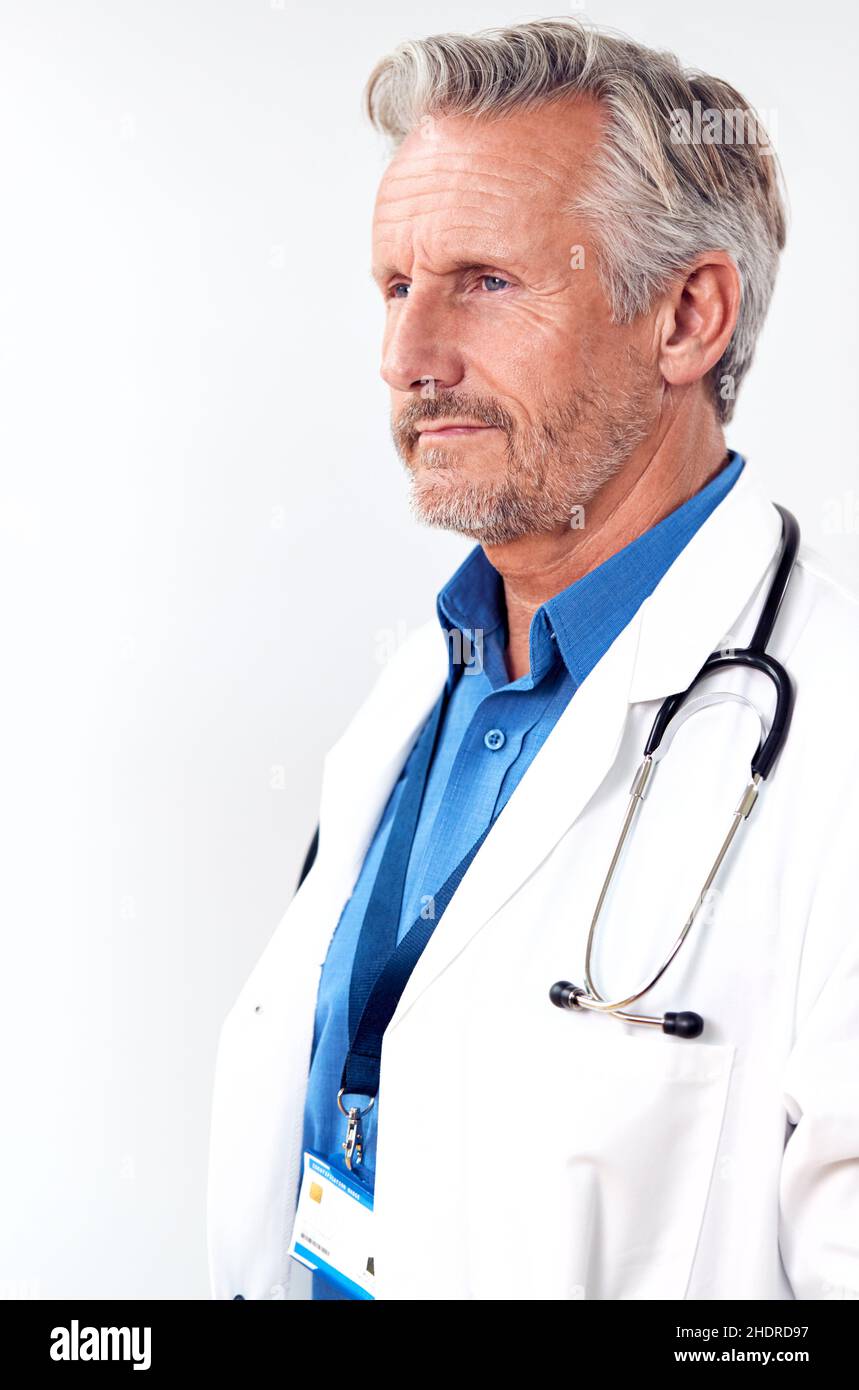 Serious mature male doctor hi-res stock photography and images - Alamy