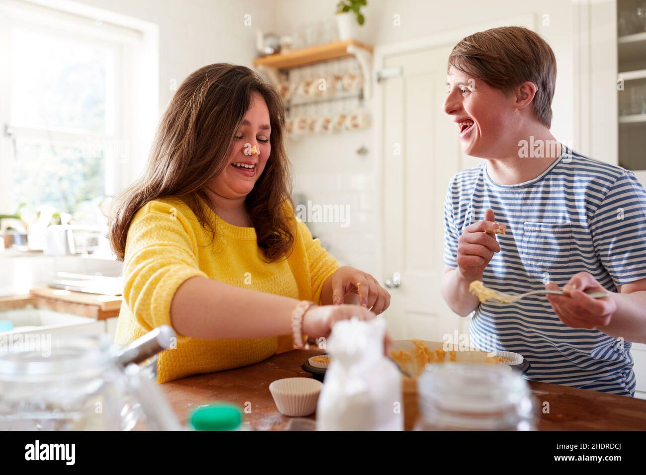 laughing, baking, Down syndrome, laugh, smiling Stock Photo - Alamy
