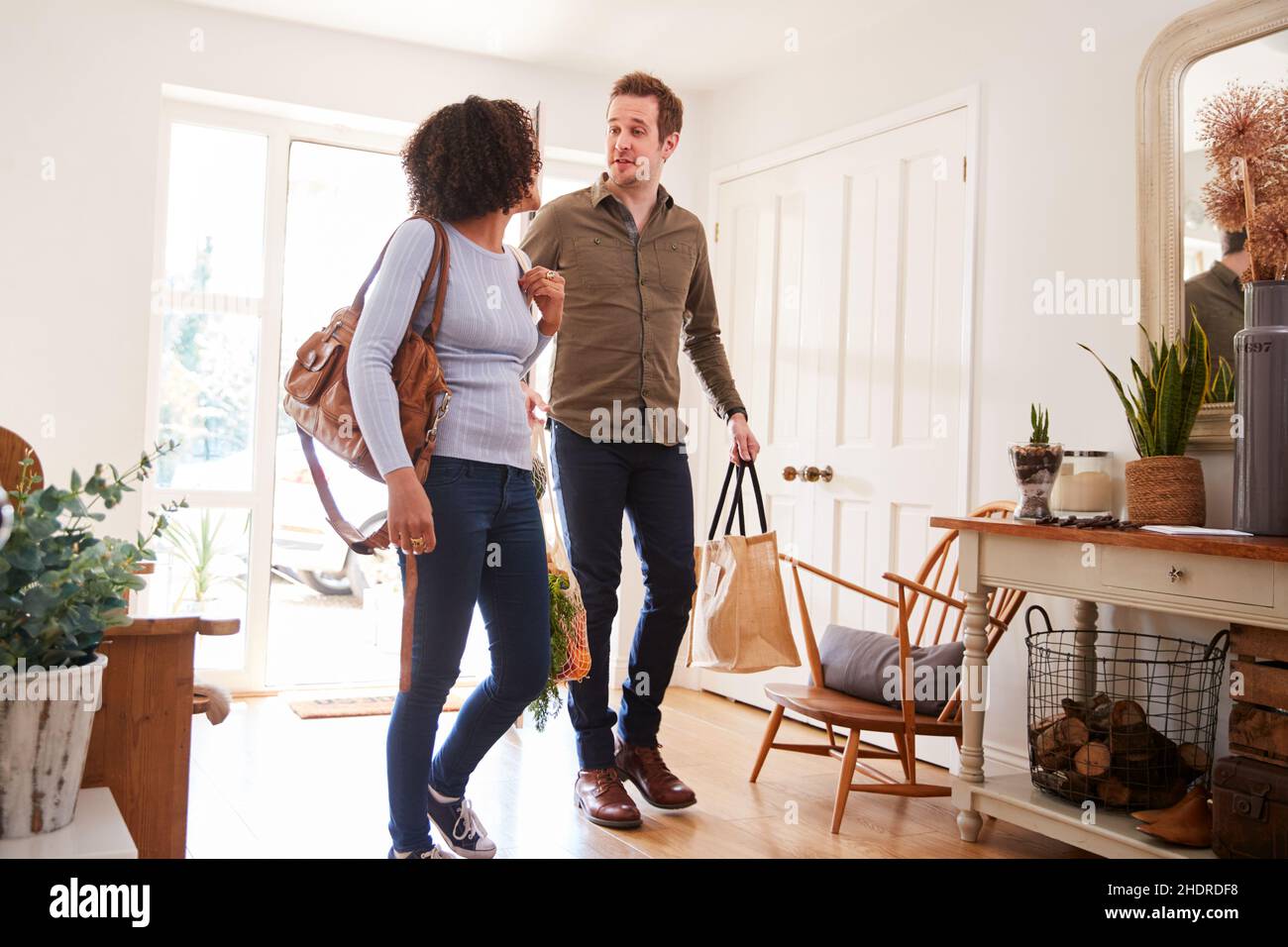 Woman arrival hi-res stock photography and images - Alamy