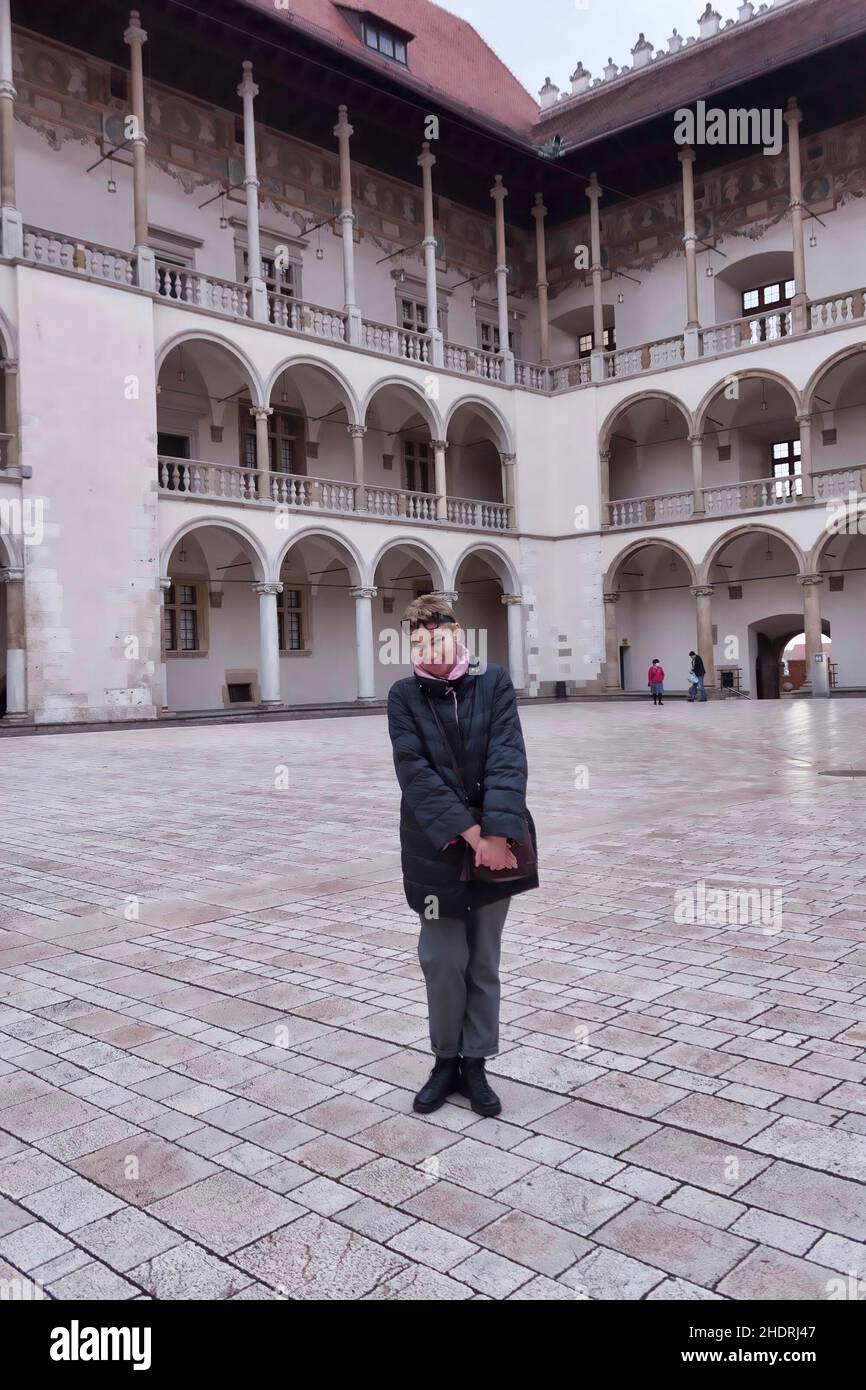 Woman building courtyard poses hi-res stock photography and images - Alamy