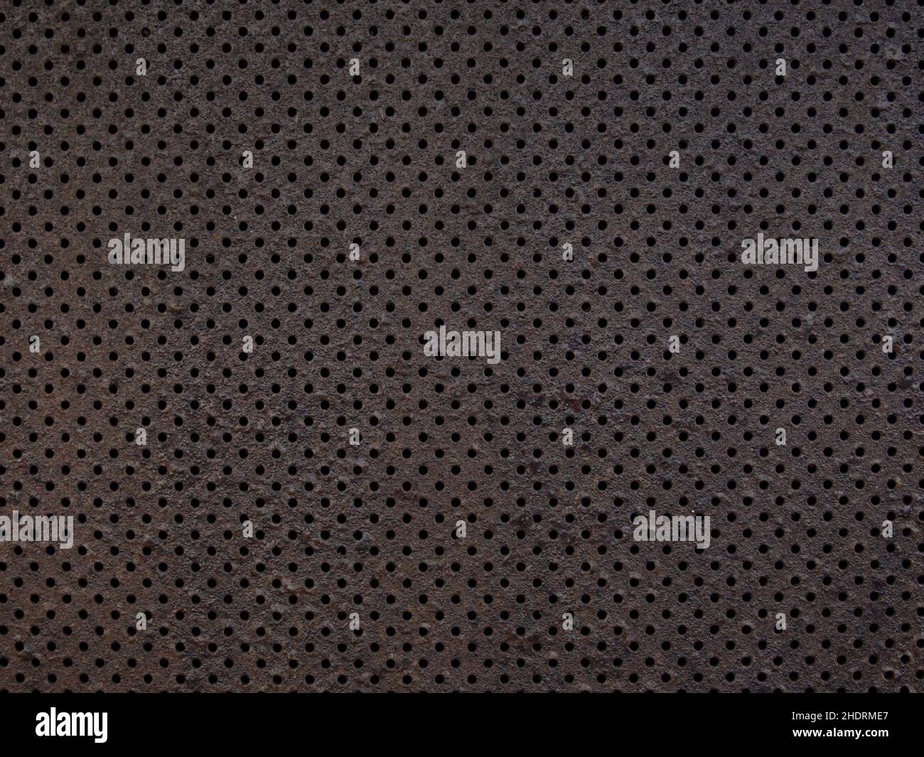 Metal plate with holes hi-res stock photography and images - Alamy