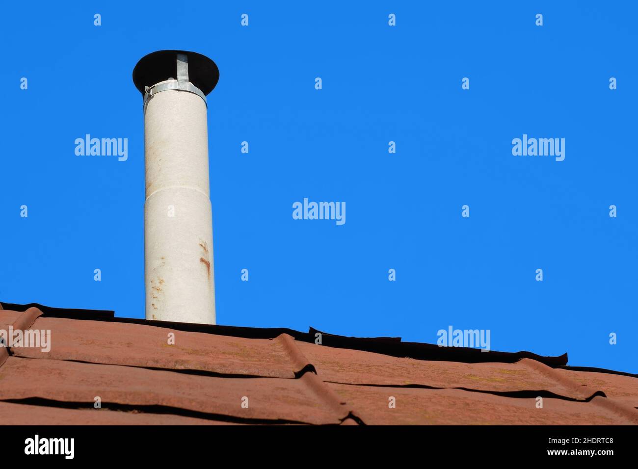 smoke stack, metal roof, smoke stacks, metal roofs Stock Photo - Alamy