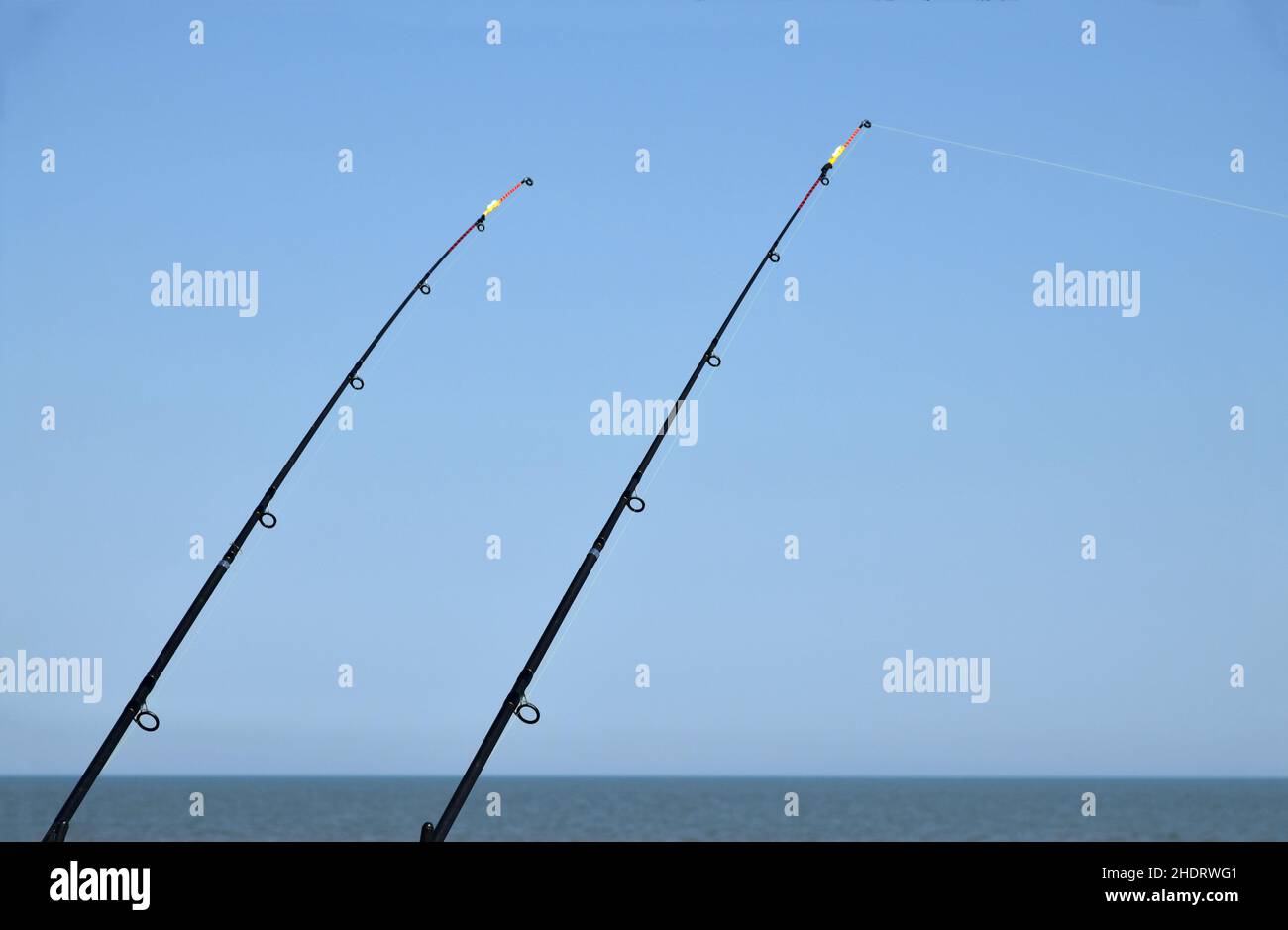 fishing rods, southwold pier, suffolk, england Stock Photo - Alamy