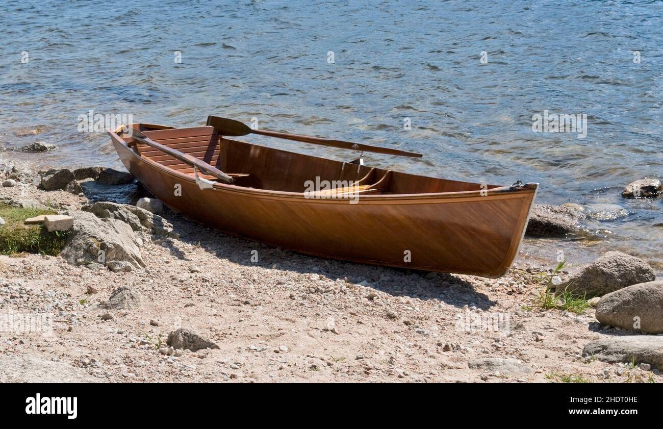Black rowboat hi-res stock photography and images - Alamy
