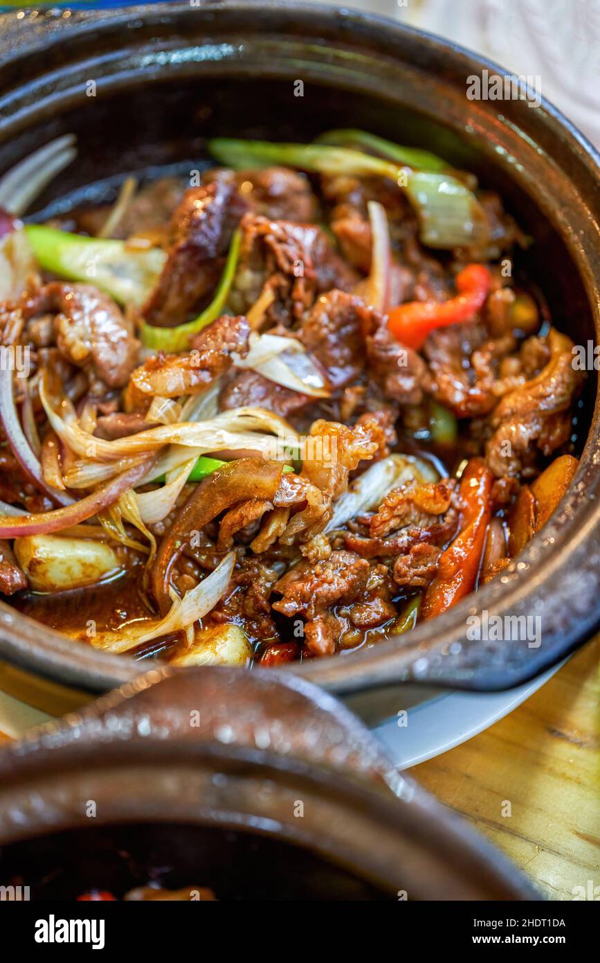 A pot of delicious and authentic traditional Cantonese cuisine in a hot ...