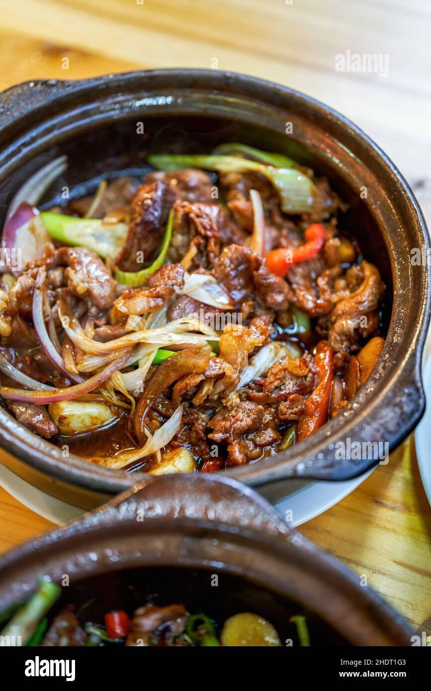 A pot of delicious and authentic traditional Cantonese cuisine in a hot ...
