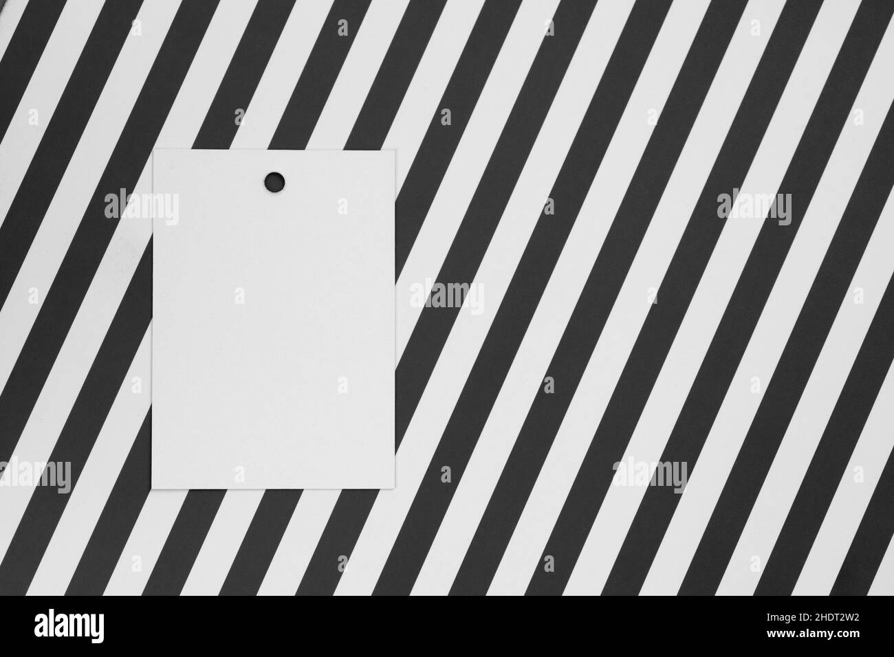 Cardboard label tag of white color for items with little hole in top ...