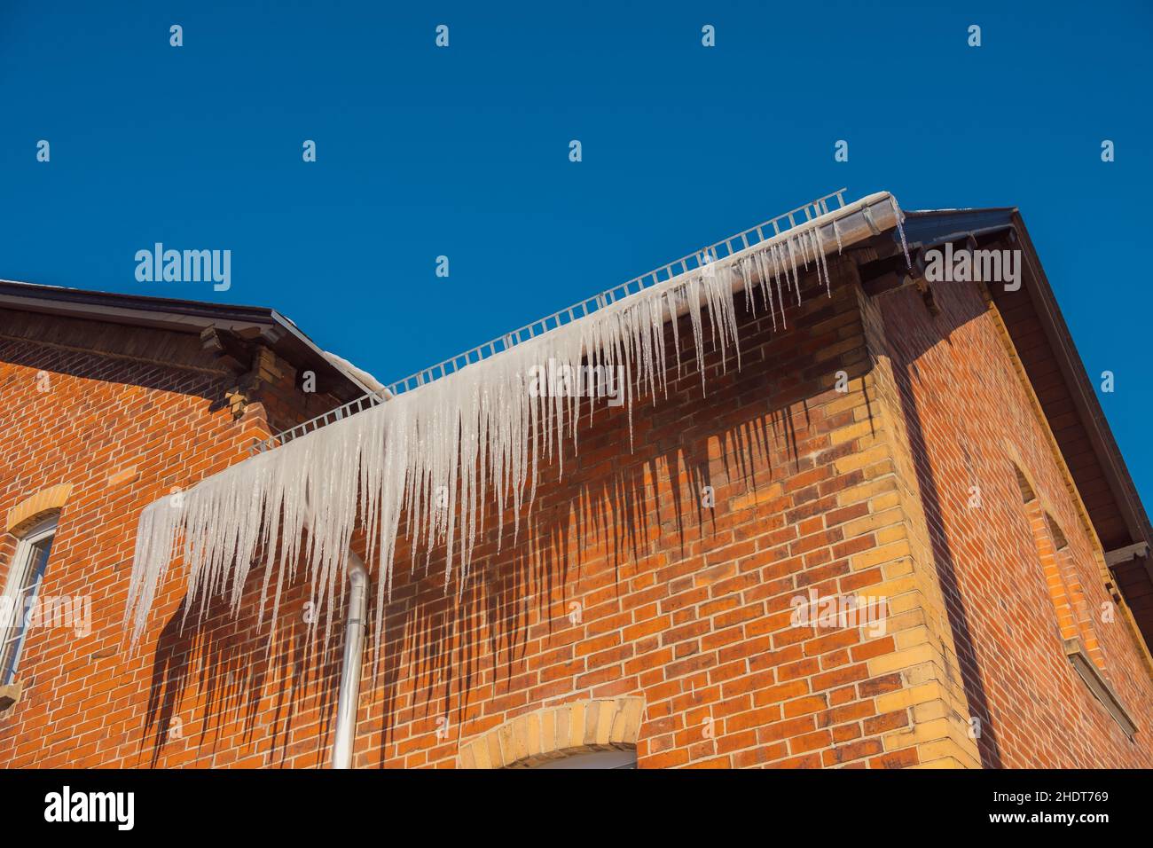 danger, icicle, roof edge, dangers, icicles, roof edges Stock Photo - Alamy