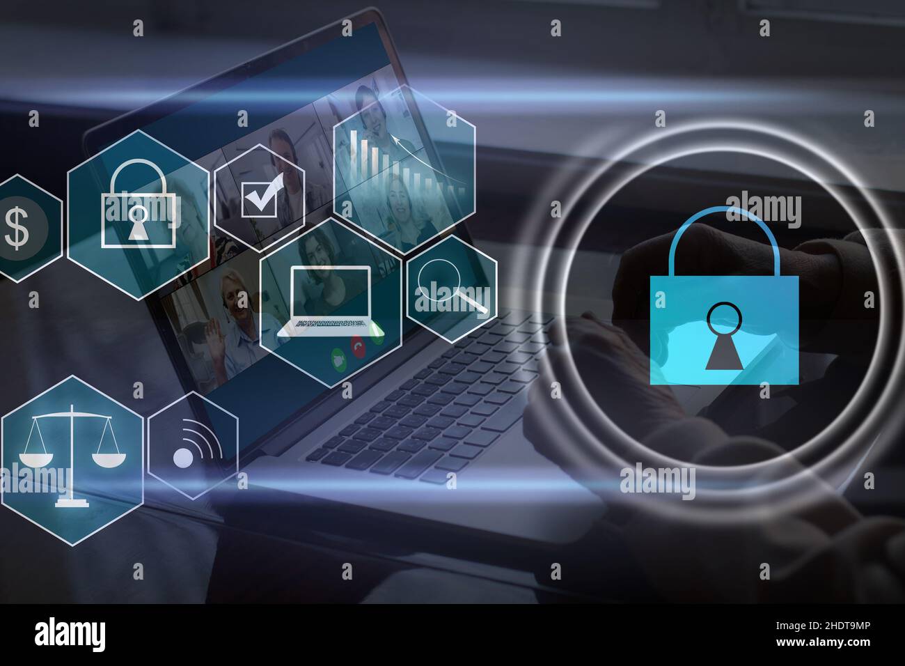 Person using a laptop computer with technology cybersecurity and ...