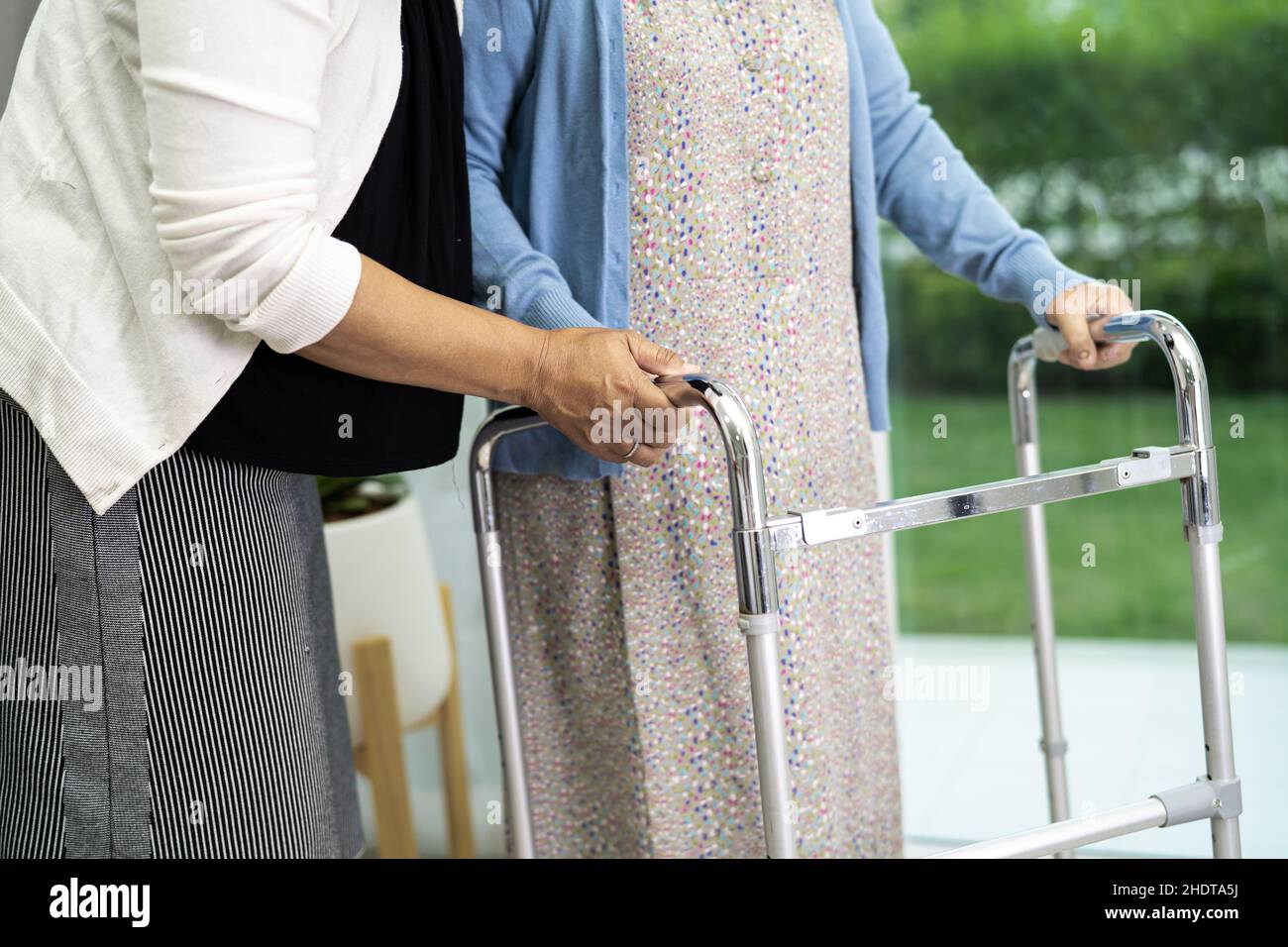 Asian senior or elderly old lady woman patient walk with walker at ...