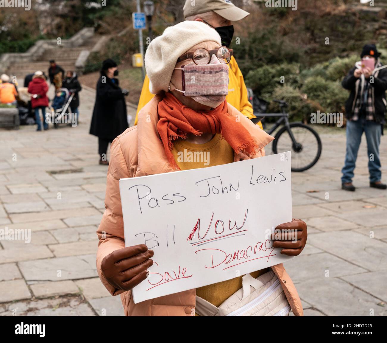 People hold posters at Vigil for Democracy on anniversary of ...