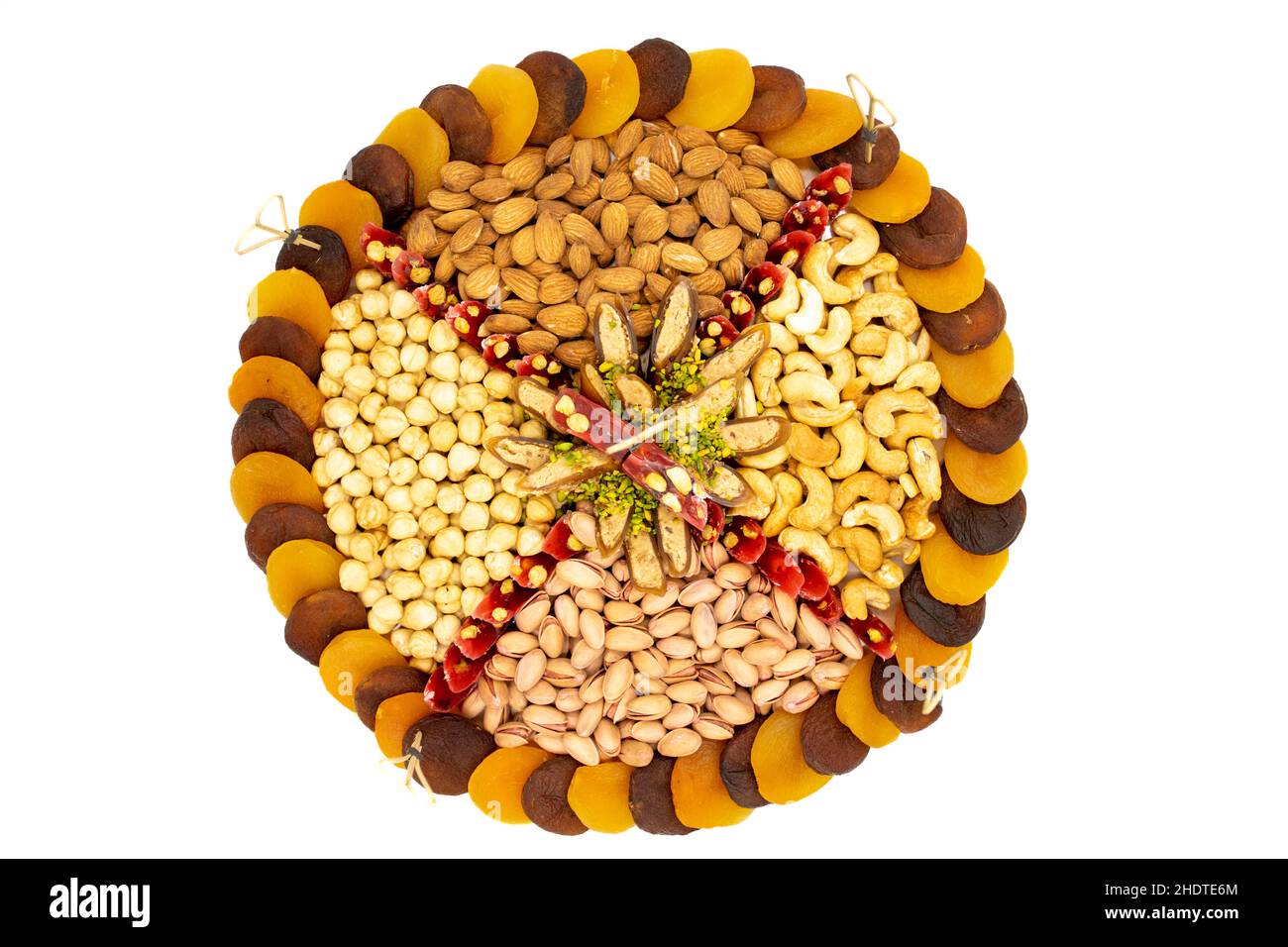 mixed nuts plate on a white background. Snack plate prepared with ...