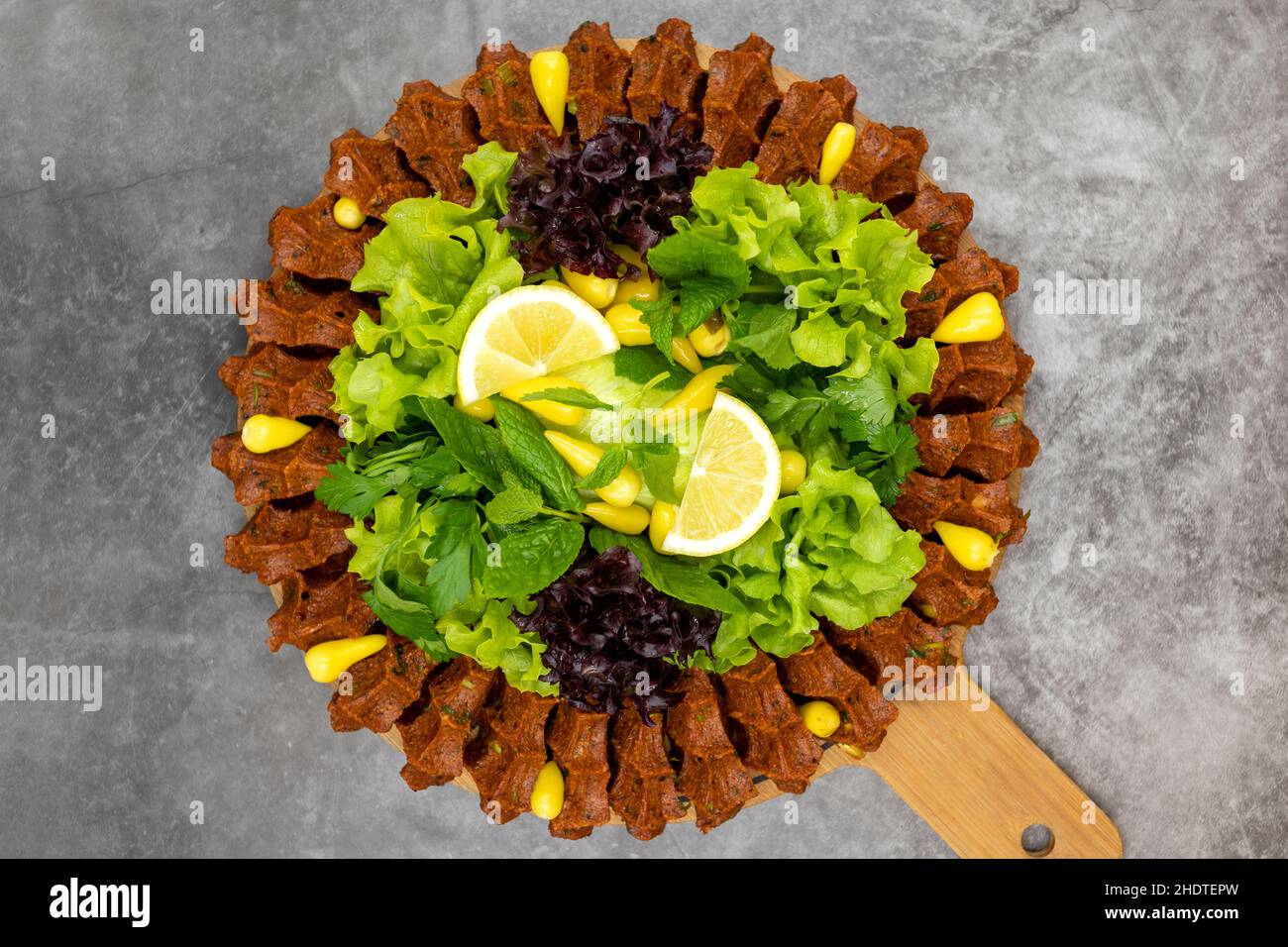 Raw meatballs (cig kofte) on a dark background. Traditional Turkish ...