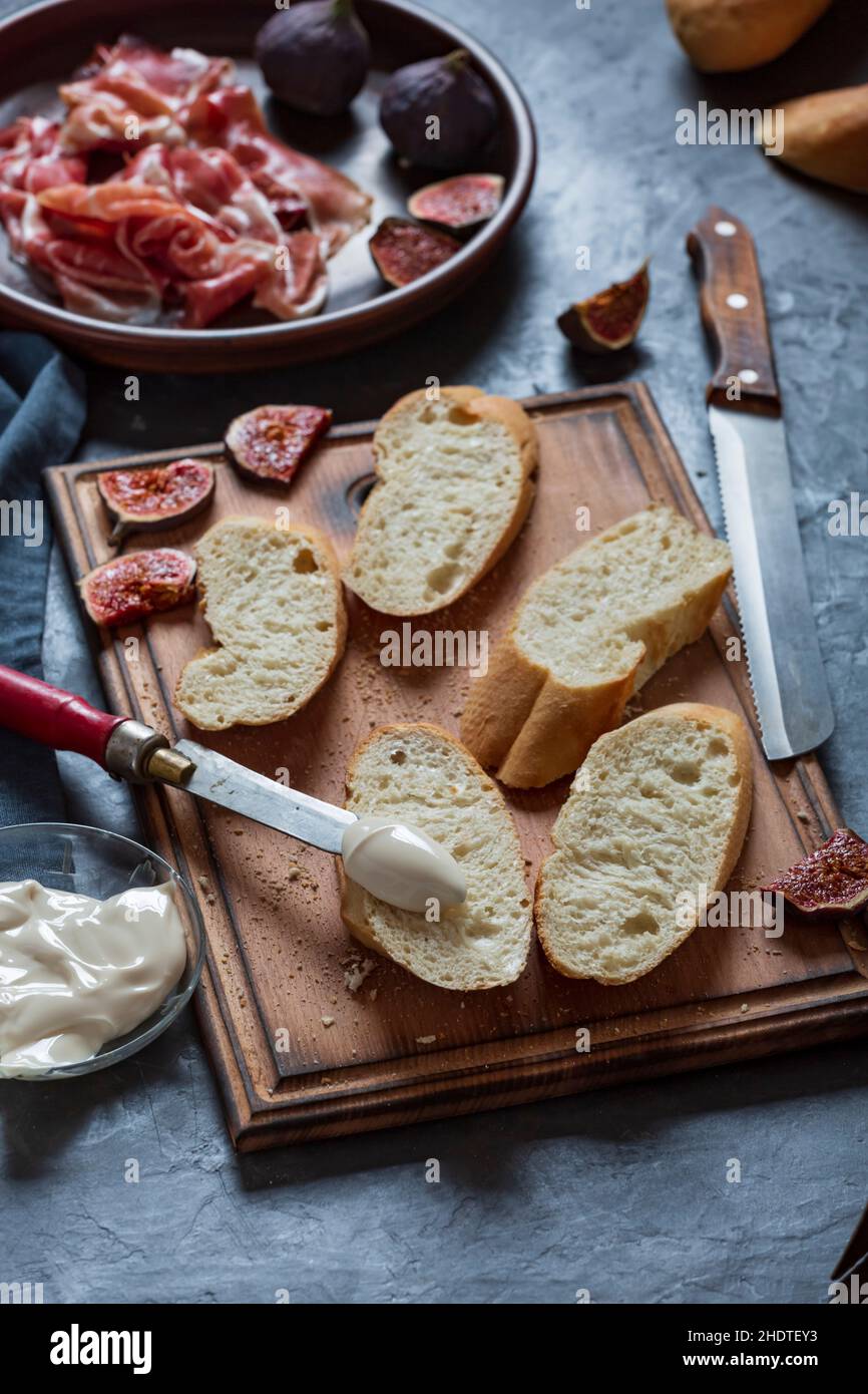 Making ham sandwiches and tapas ingredients, CLOSE UP Stock Photo - Alamy