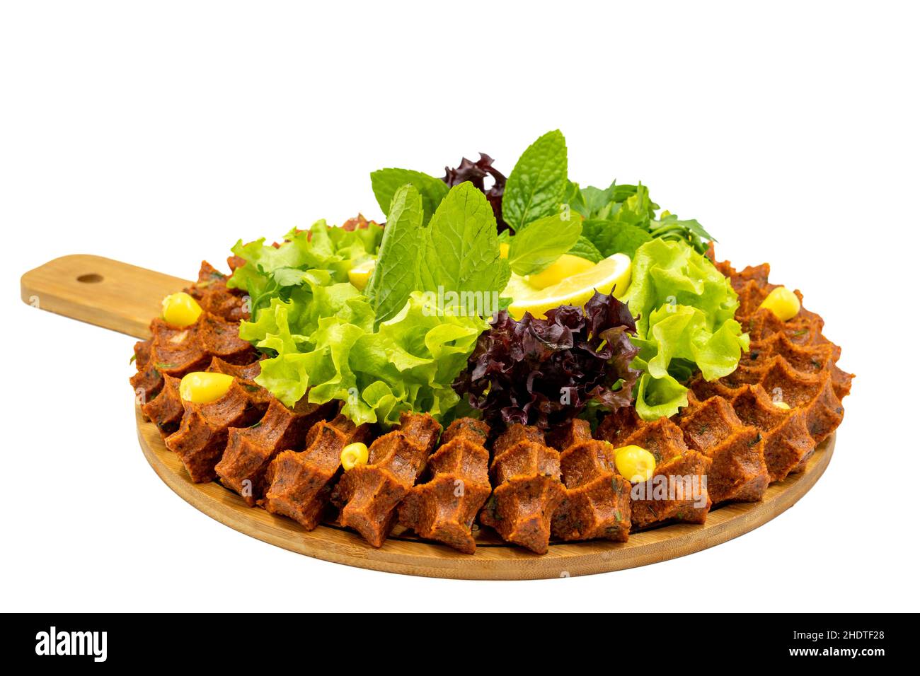 Raw meatballs (cig kofte) isolated on a white background. Traditional ...