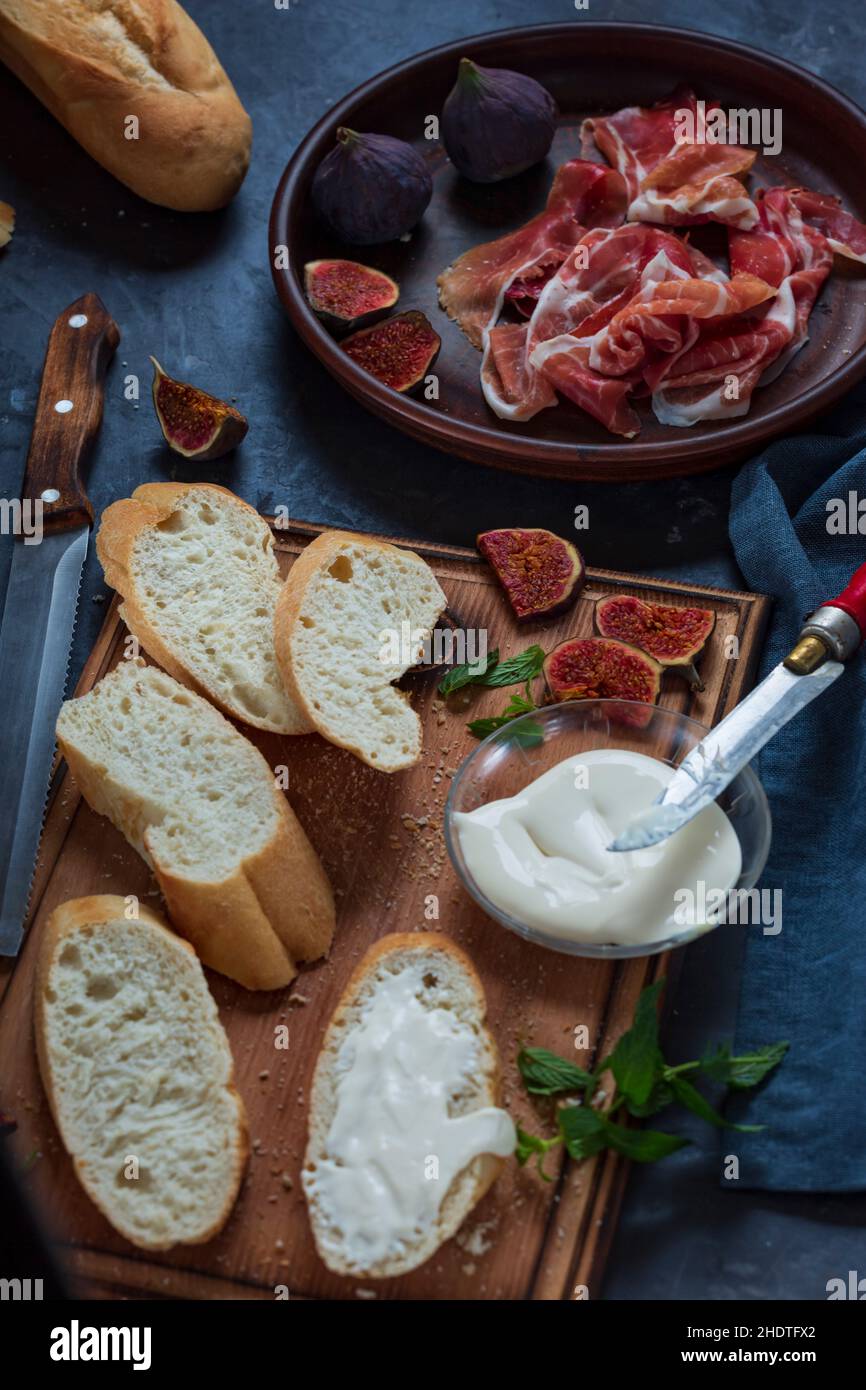 Making ham sandwiches and tapas ingredients, CLOSE UP Stock Photo - Alamy