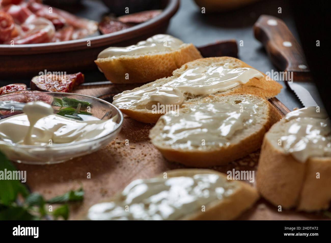 Making ham sandwiches and tapas ingredients, CLOSE UP Stock Photo - Alamy