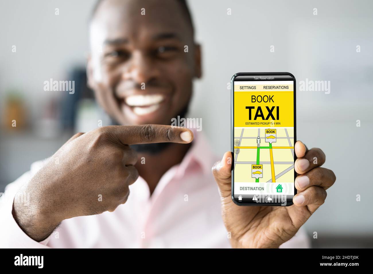Cab Booking And Online Taxi App On Mobile Phone Stock Photo - Alamy