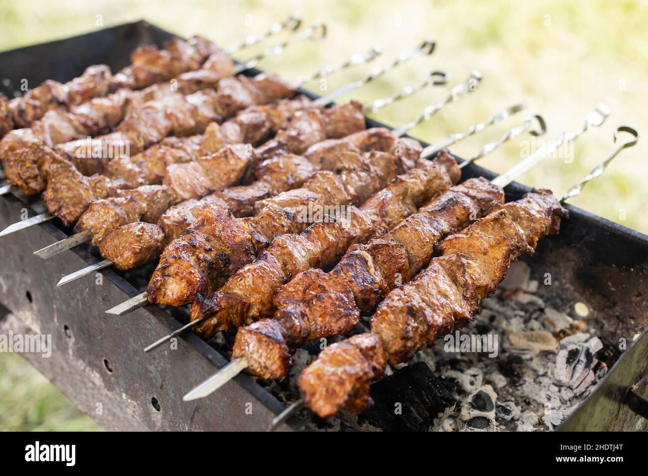 delicious bbq kebab grilling on open grill, outdoor kitchen. food ...