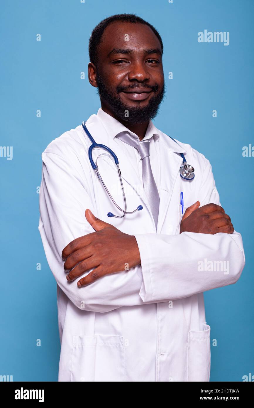 Vertical portrait of african american medical doctor with stethoscope ...