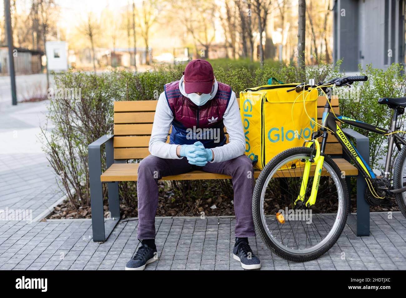 KIEV, UKRAINE - April 28, 2021: Glovo bike courier on the street ...