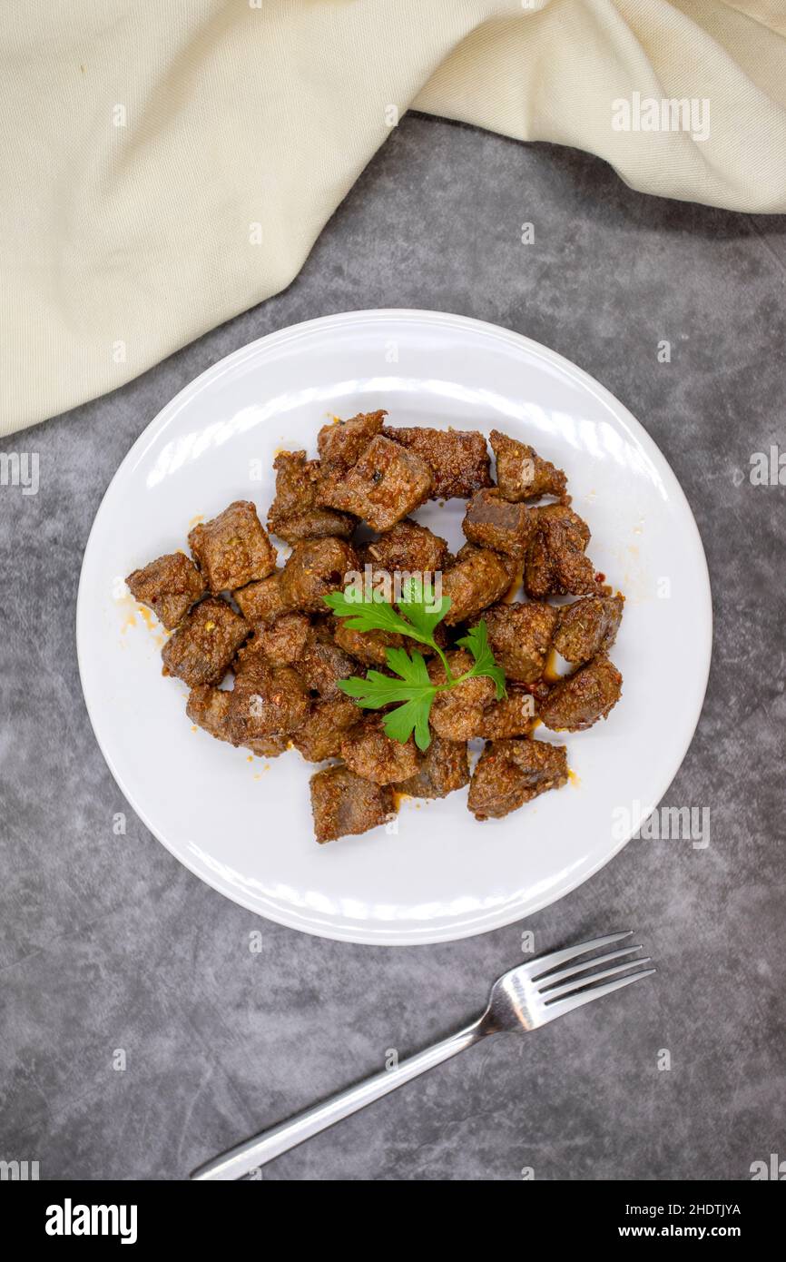 Fried liver cubes on a dark background. Turkish Traditional Food ...