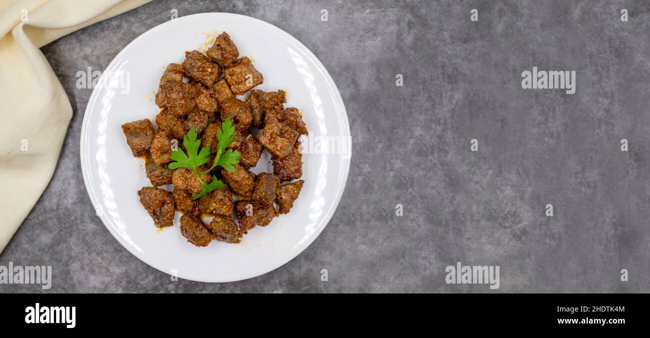 Fried liver cubes on a dark background. Turkish Traditional Food ...