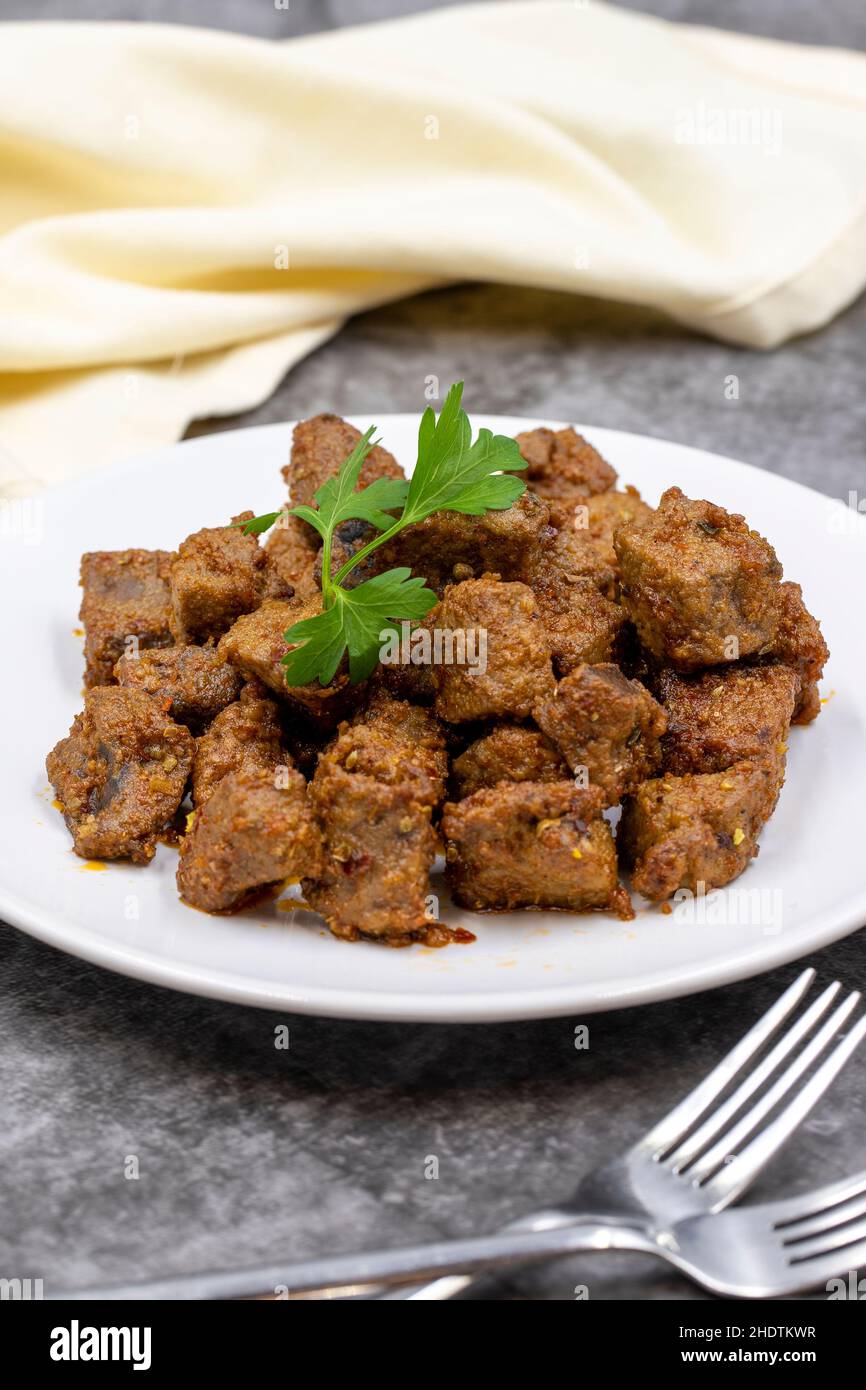 Fried liver cubes on a dark background. Turkish Traditional Food ...