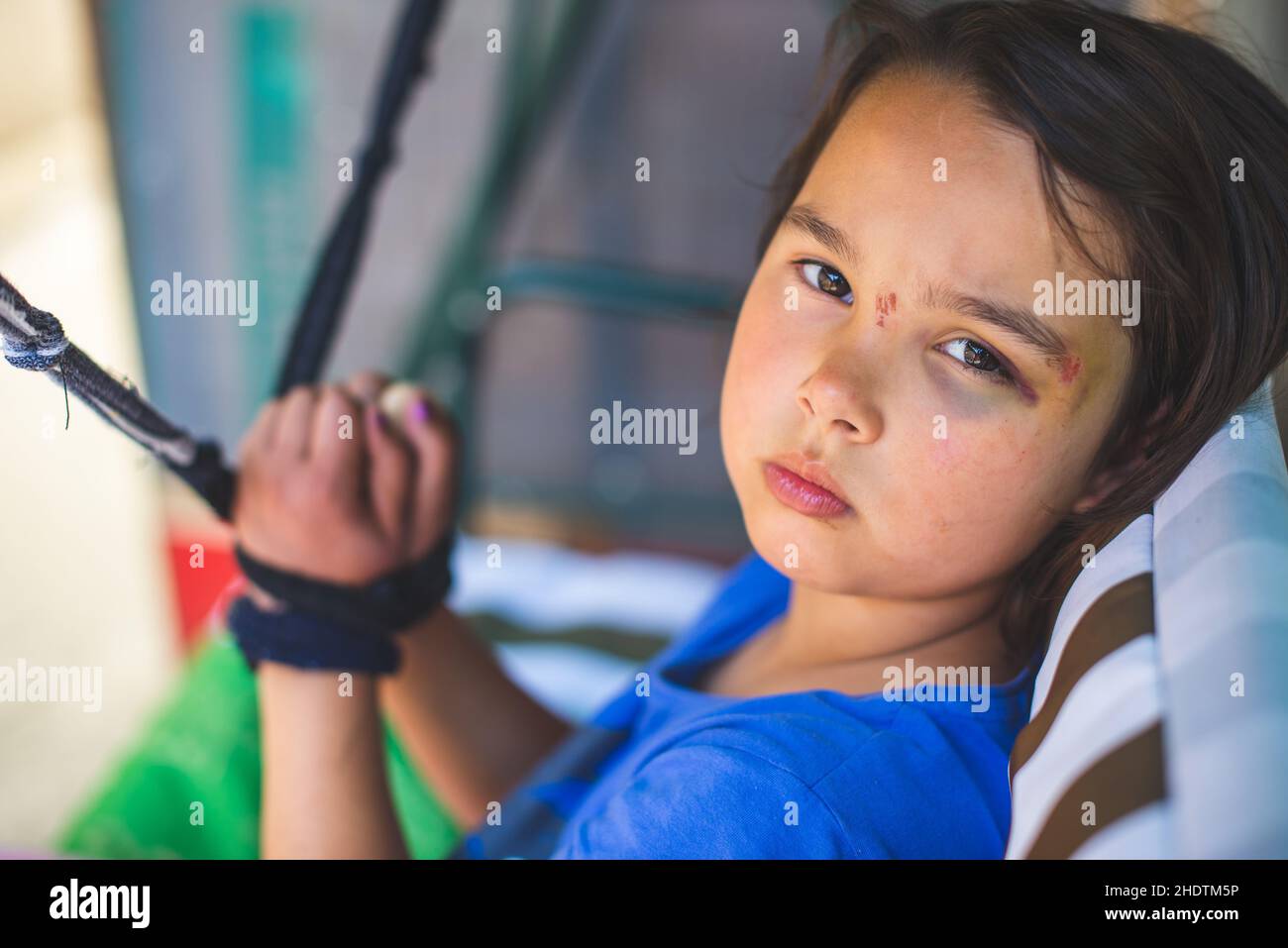 little girl with blindfolds and tied. Abuse concept Stock Photo - Alamy