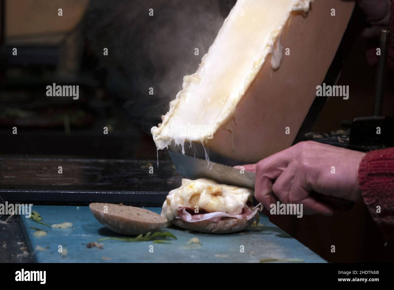 Raclette panini melted swiss cheese sandwich Stock Photo - Alamy